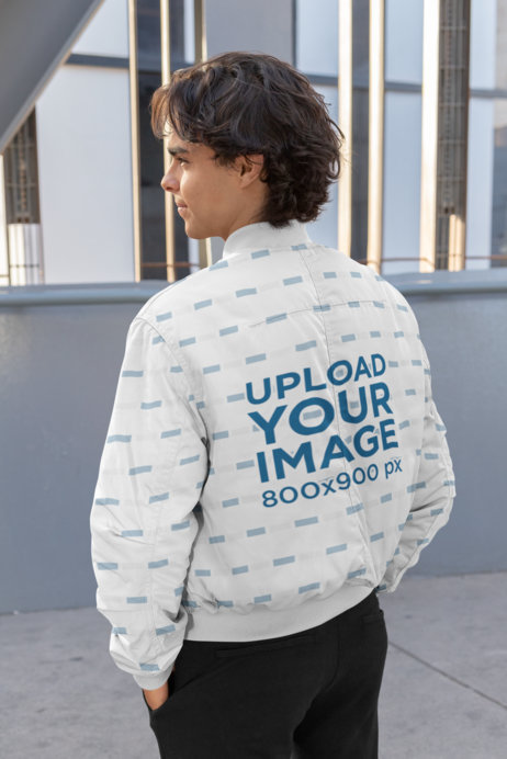 Placeit - Back View Mockup Featuring a Man with a Sublimated Jacket