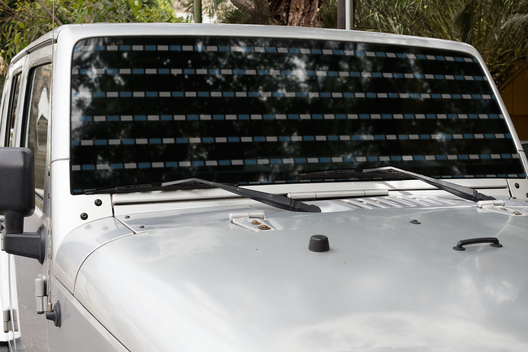 Placeit - Mockup of a Window Decal Placed on the Windshield of an Off ...