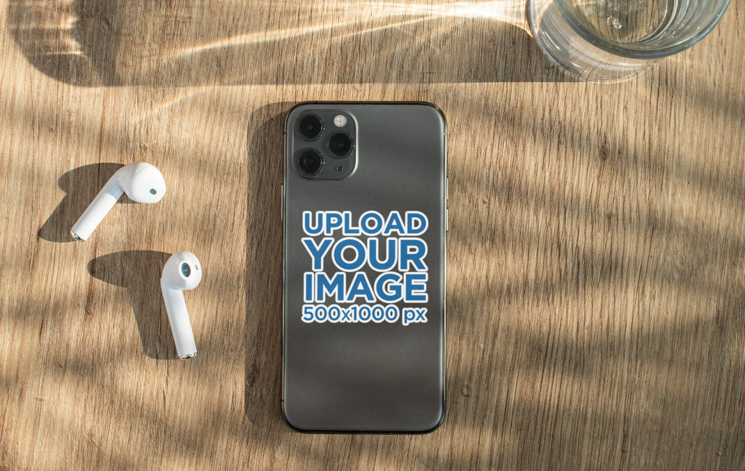 Placeit - Sticker Mockup Featuring a Phone and Headphones