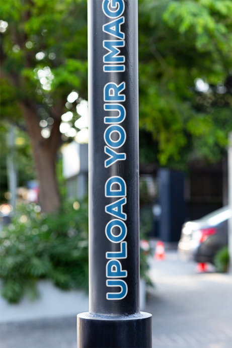 Placeit - Mockup of a Sticker Placed on a Light Pole