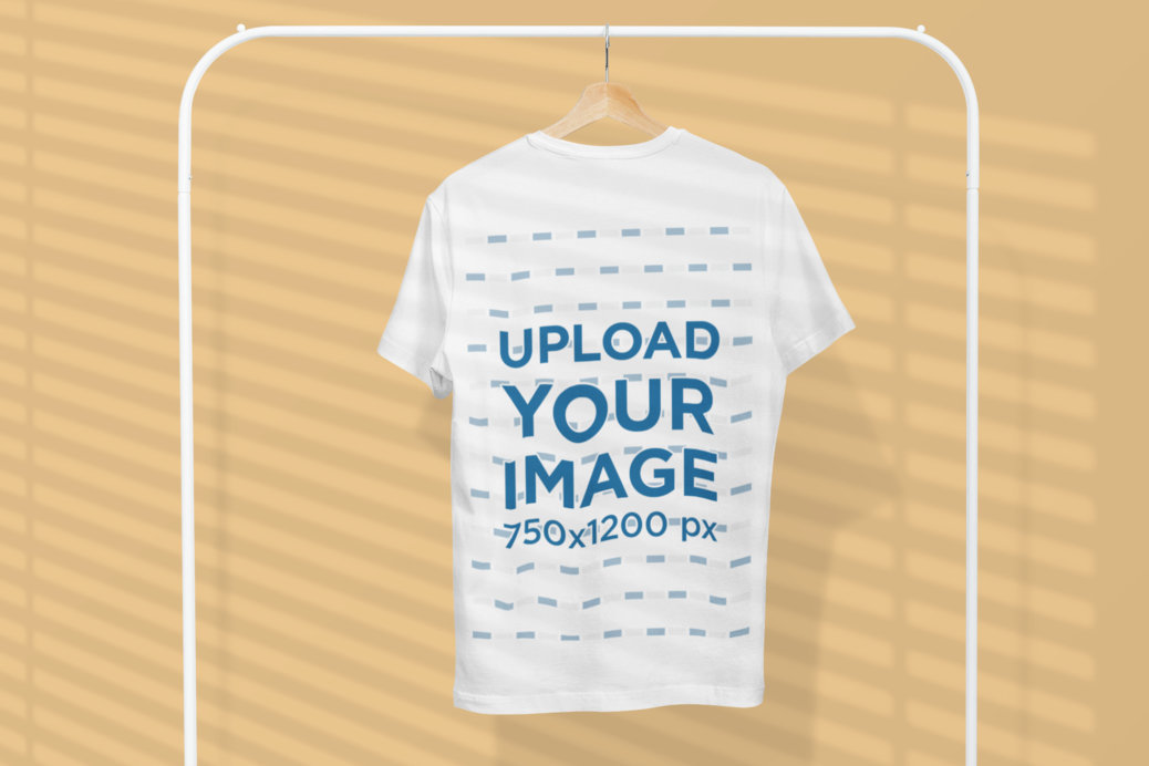 Placeit - Mockup of a T-Shirt Hanging Alone From a Rack
