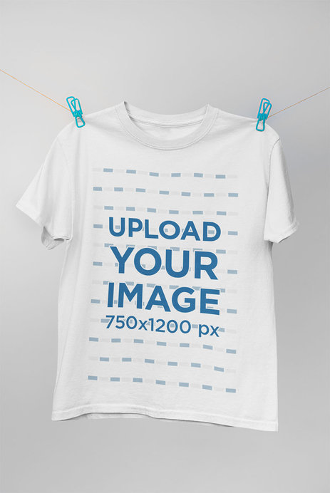 Placeit - Mockup of a Tee Hanging by Two Clothespins