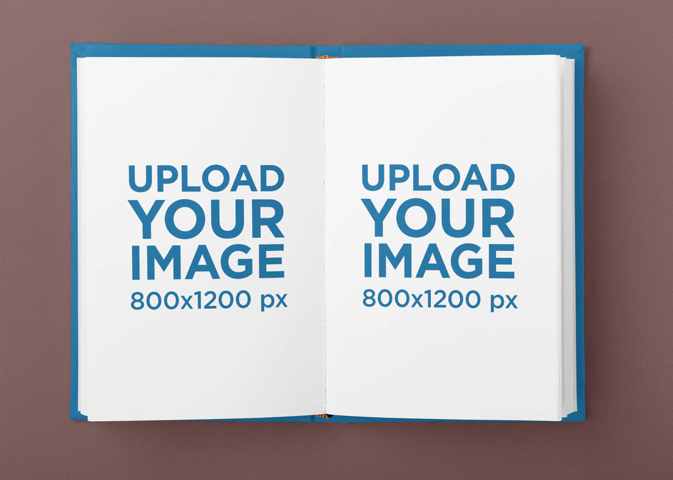 Placeit - Mockup of a Wide-Open Hardcover Book