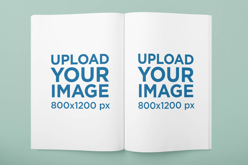 Placeit - Mockup of a Wide Open Paperback Book in a Minimalist Setting