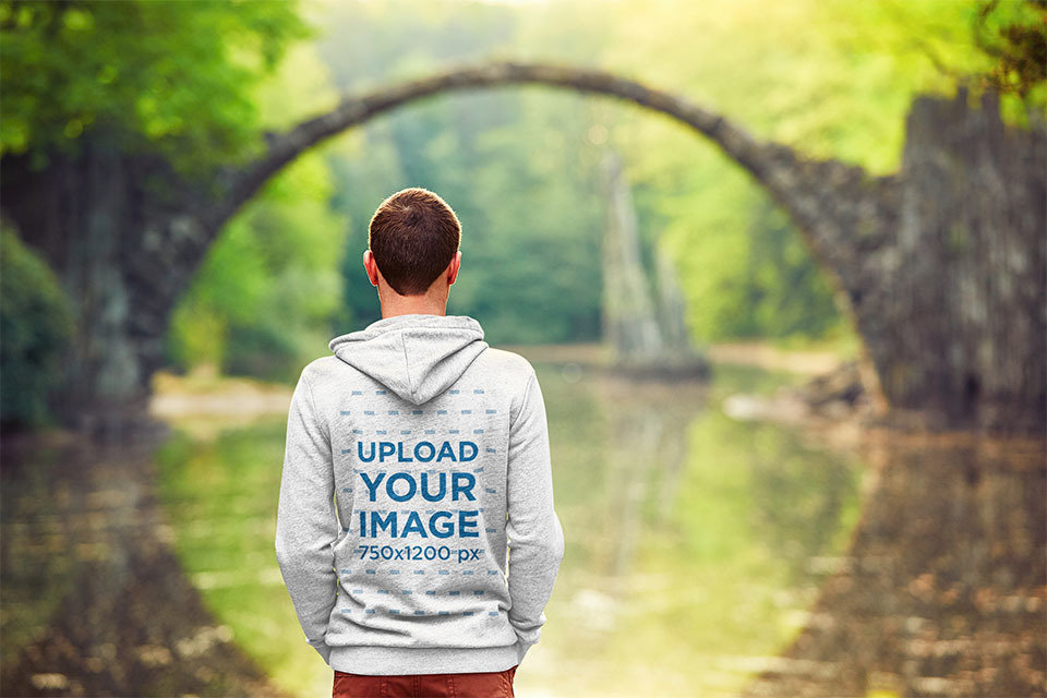 Placeit - Back-View Mockup of a Man Admiring a Nature Landscape
