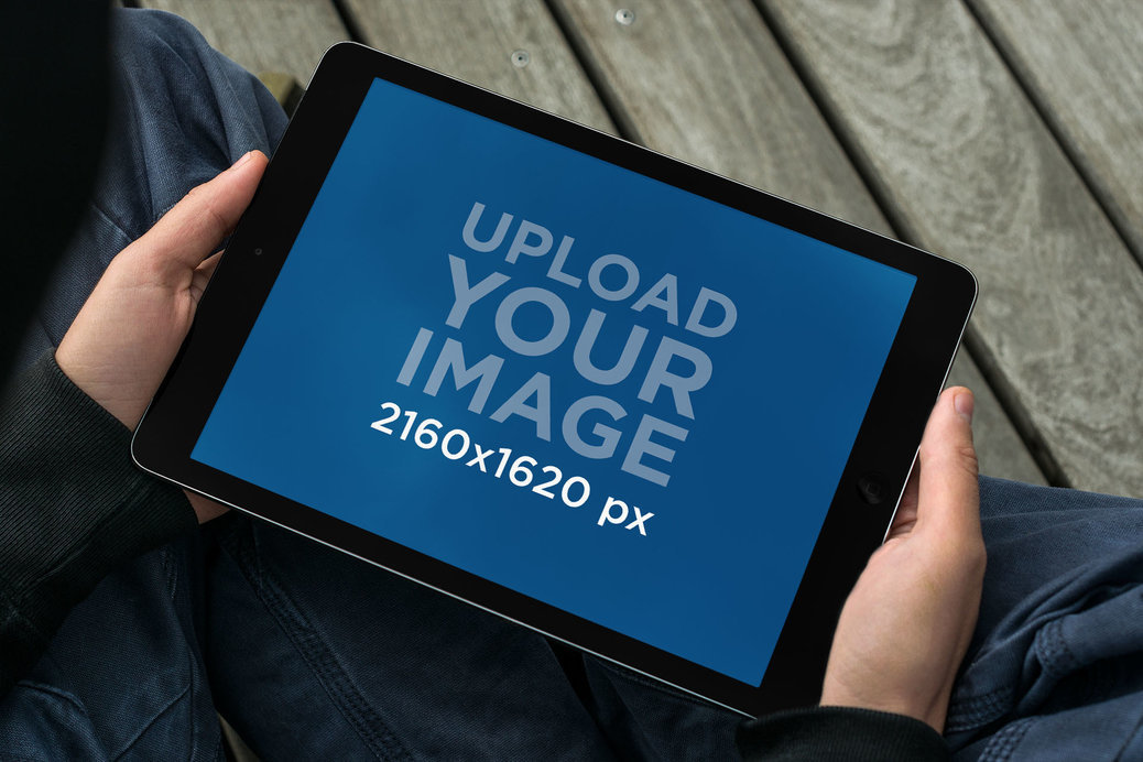 Placeit - Mockup of a Person Using an iPad in Landscape Position