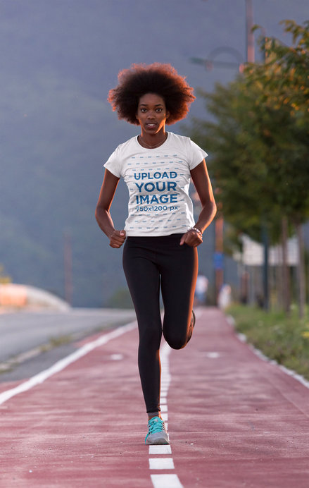 Placeit - T-Shirt Mockup of a Female Runner on a Track