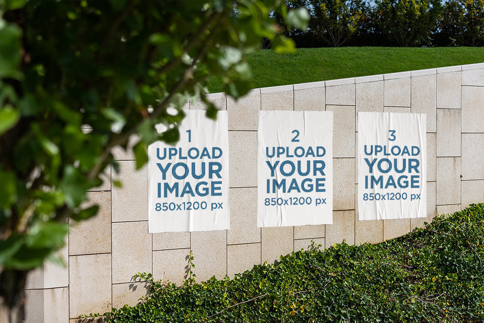 Placeit - Mockup of Three Paper Posters on a Wall