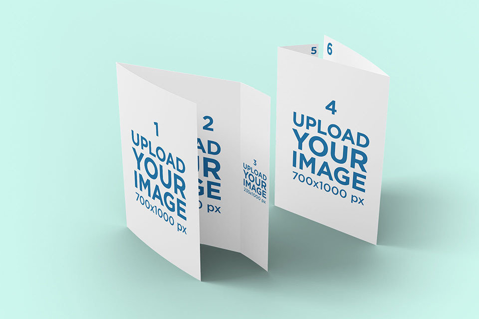 Placeit - Mockup of Two Wrap-Around Brochures in a Plain Setting