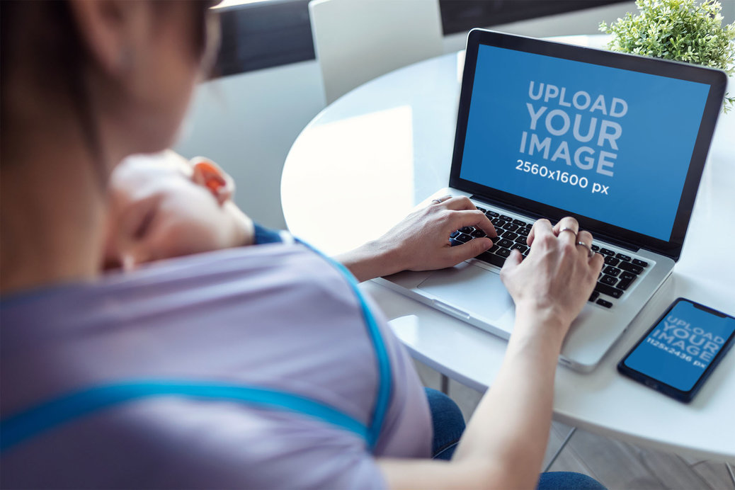 Placeit - MacBook and iPhone 11 Mockup of a Mom Working From Home