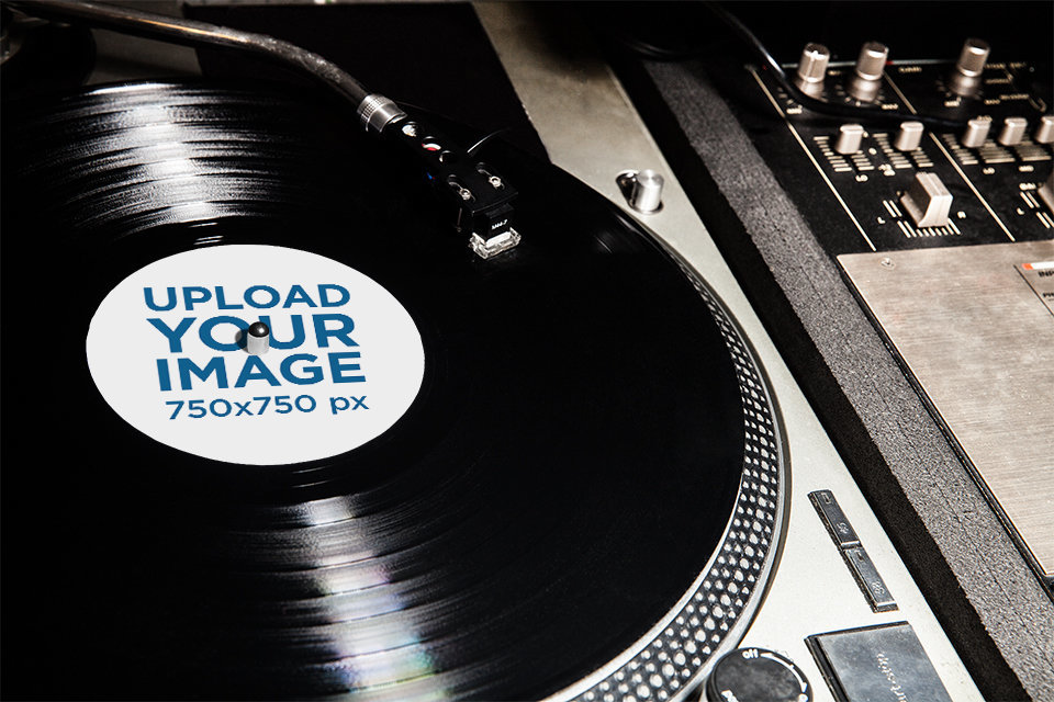 Placeit - Vinyl Record Mockup Featuring a DJ's Console