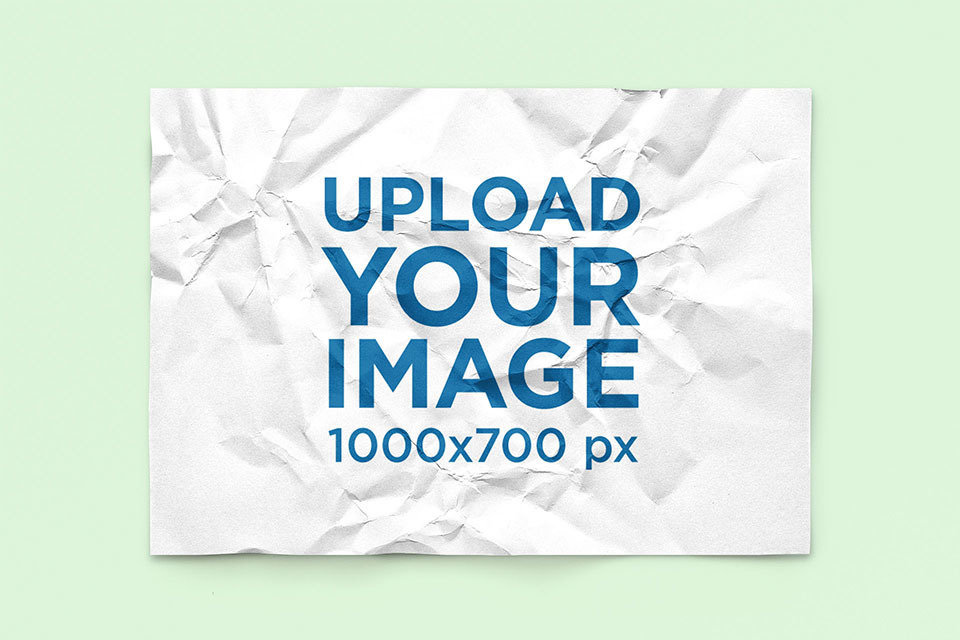 Placeit - Mockup of a Crumpled Horizontal Flyer on a Solid Color Surface