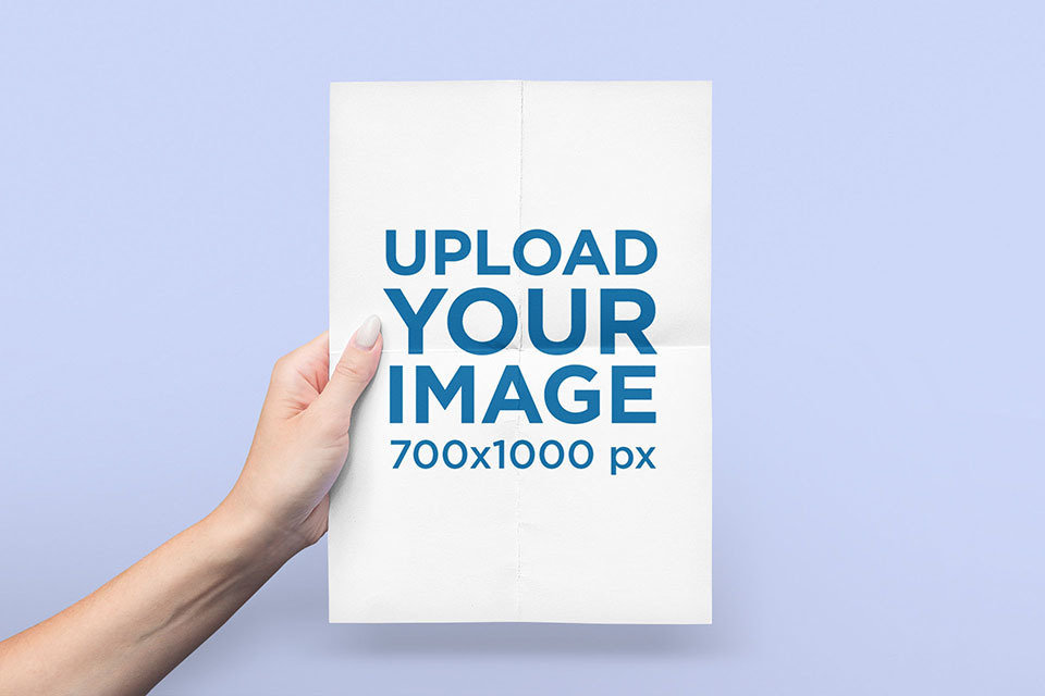 Placeit - Mockup Featuring a Woman's Hand Holding a Vertical Flyer