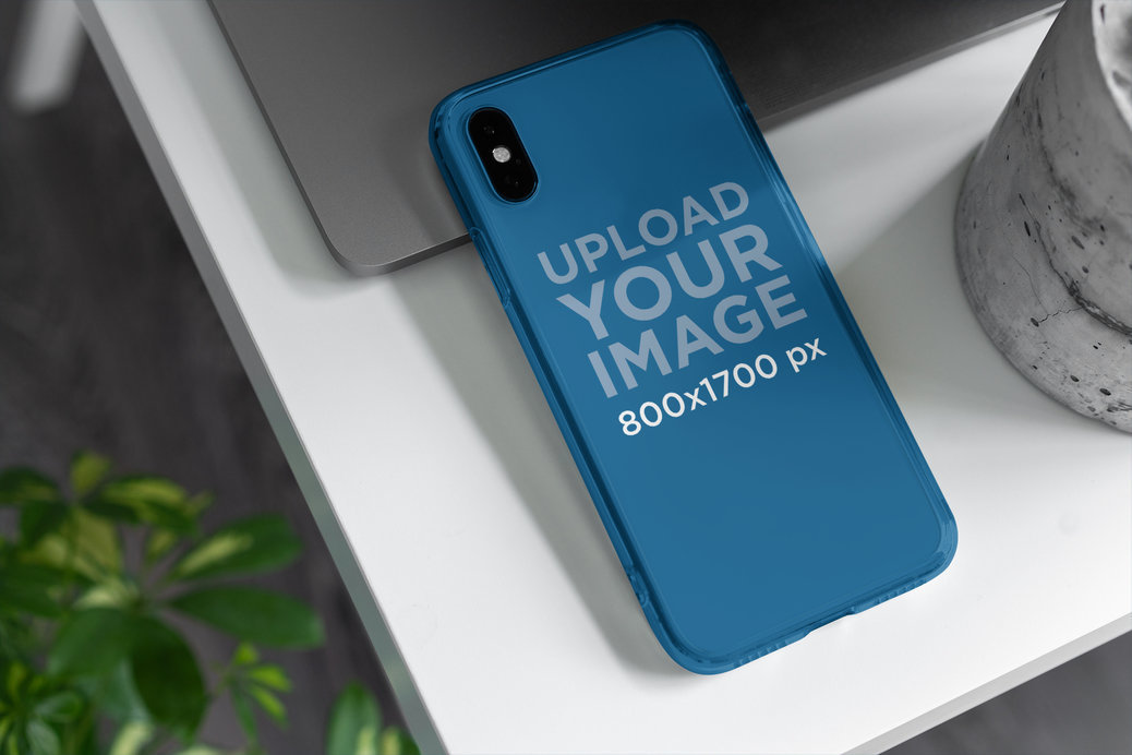 Placeit - Mockup of a Clear Phone Case Placed on a Desk