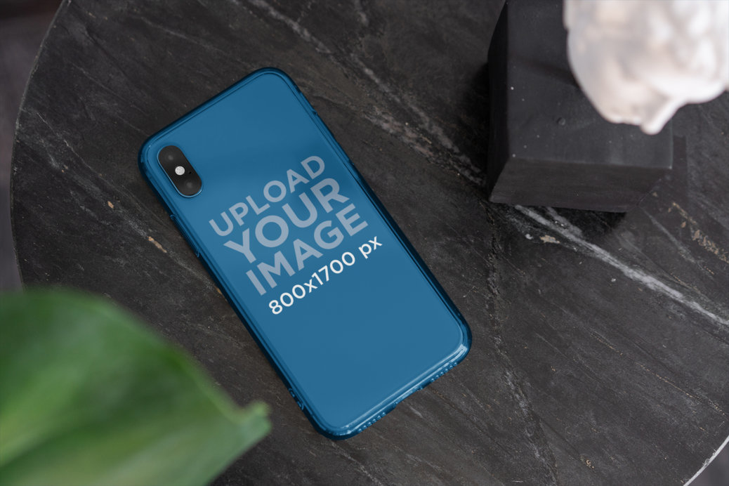 Placeit - Mockup of a Clear Phone Case Placed on a Table