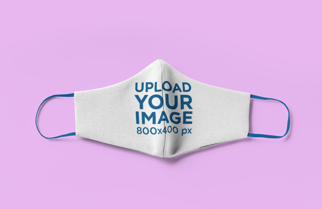 Placeit - Mockup of a Face Mask Lying on a Solid Color Surface
