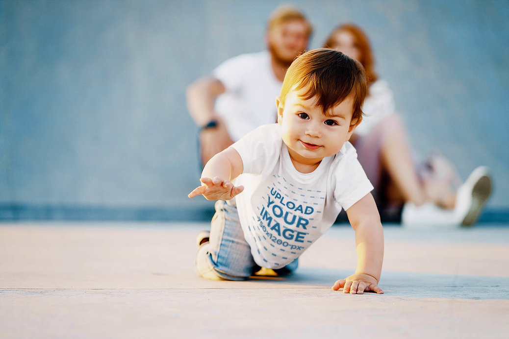Placeit - T-Shirt Mockup Featuring a Toddler Taking His First Steps