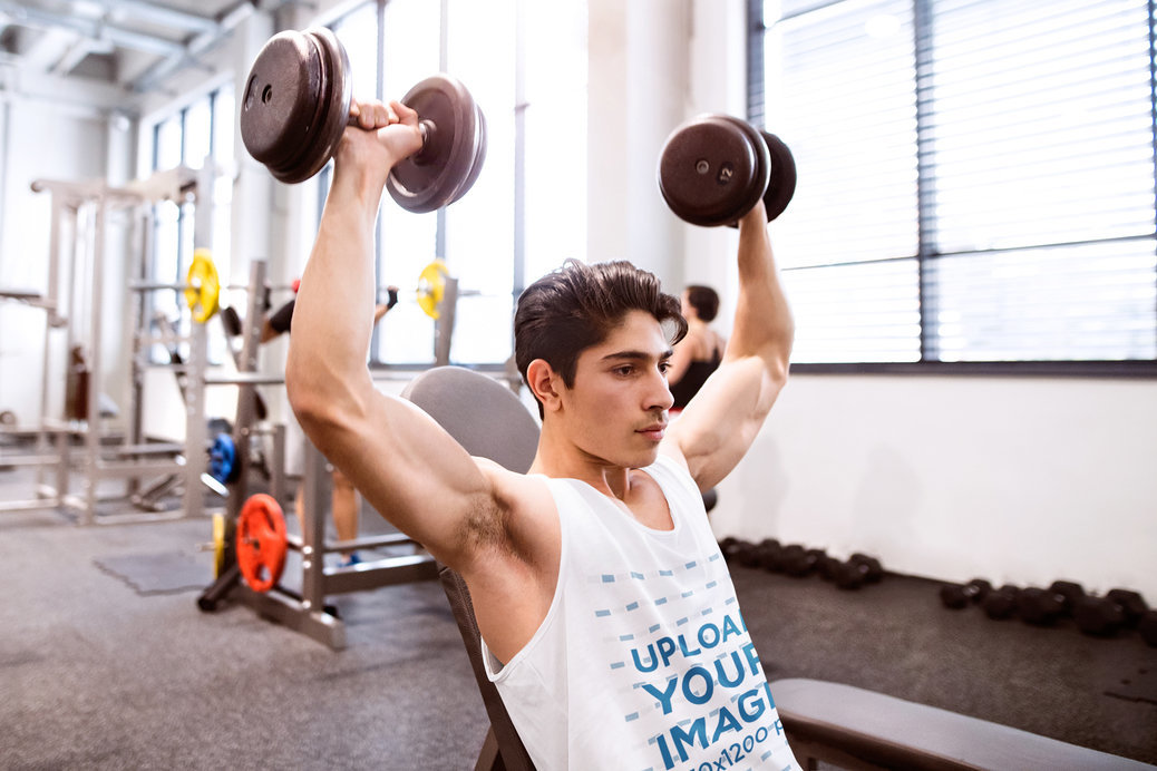 Placeit - Tank Top Mockup of a Man Lifting a Pair of Dumbbells