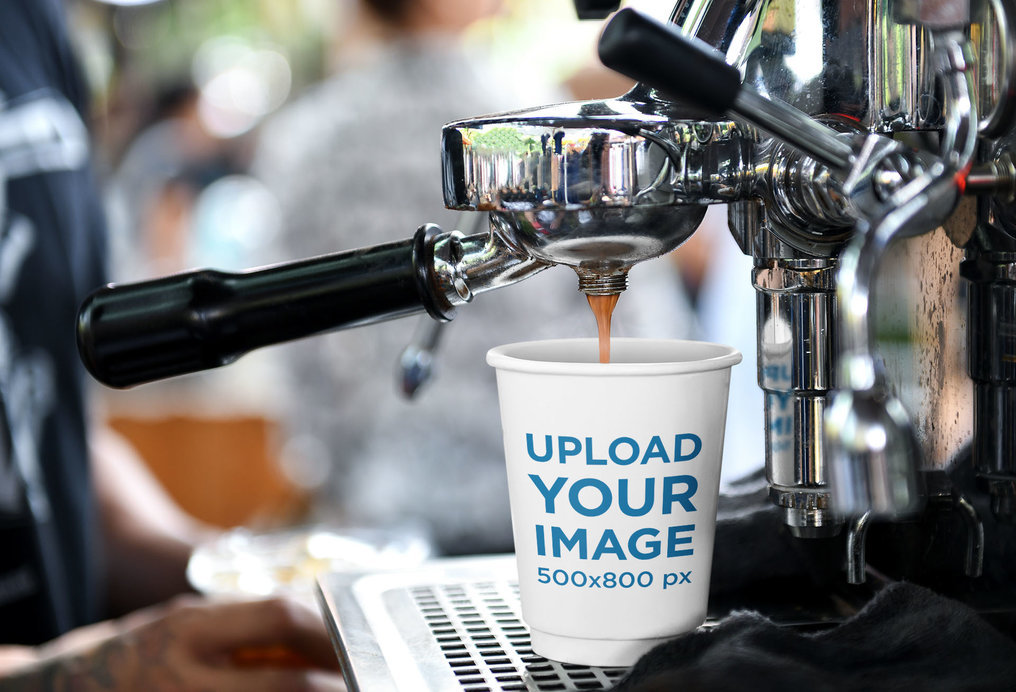 Placeit - Coffee Cup Mockup Featuring an Espresso Machine
