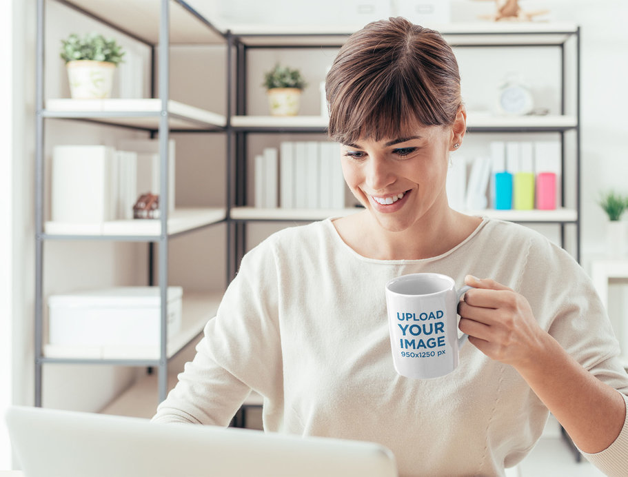 Placeit - Coffee Mug Mockup of a Woman Working From Home