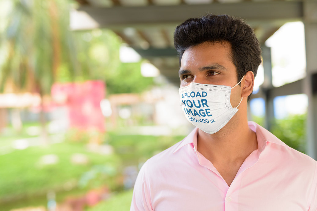 Placeit - Mockup of a Man Wearing a Customizable Face Mask