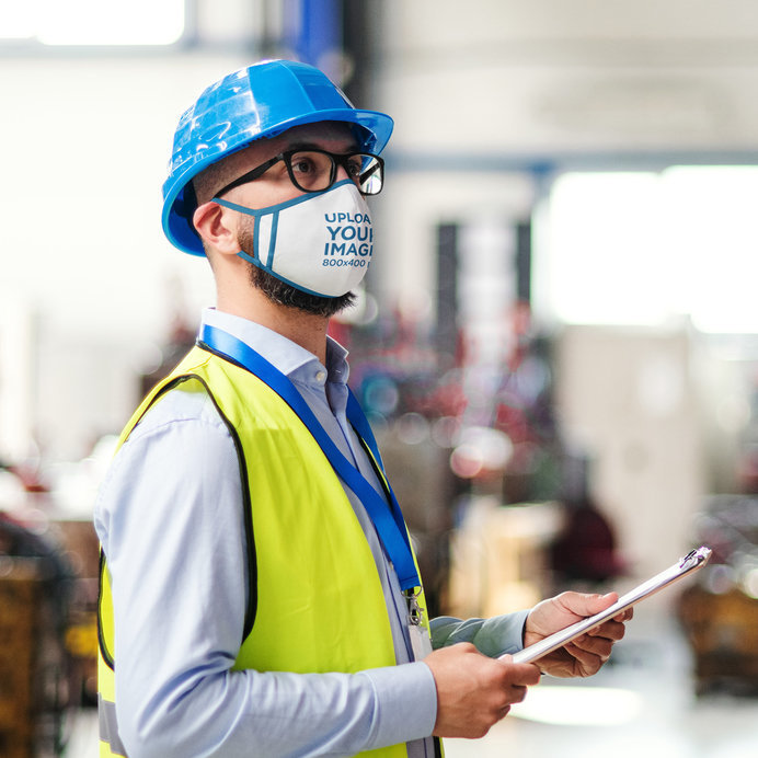 Placeit - Mockup of a Worker Wearing a Face Mask