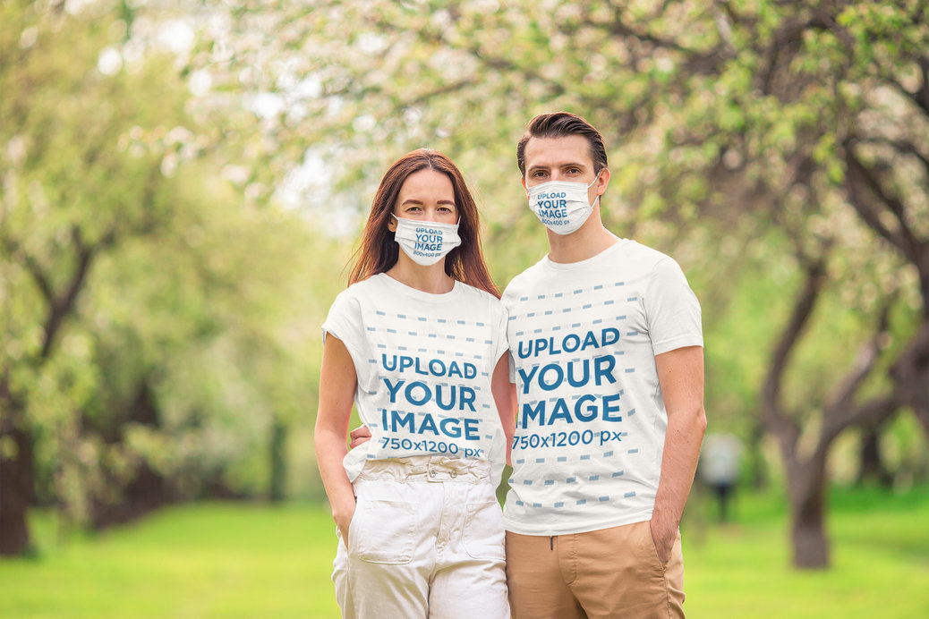Placeit - T-Shirt Mockup of a Couple Wearing Face Masks