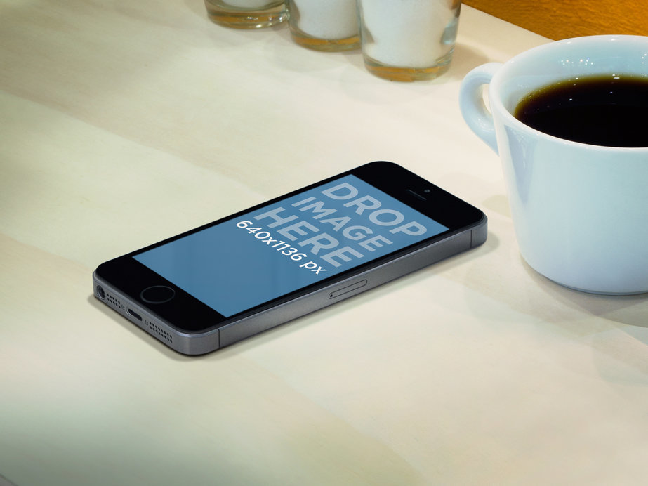 Placeit - Mockup of an iPhone 5S Placed over a Counterbar