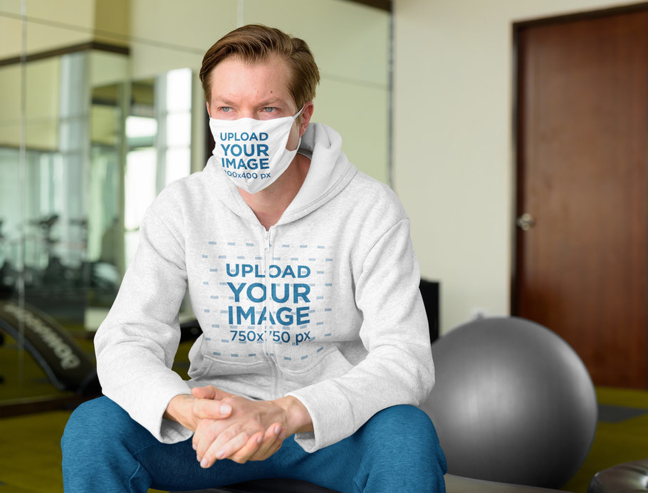 Placeit - Face Mask Mockup of a Man Wearing a Full-Zip Hoodie