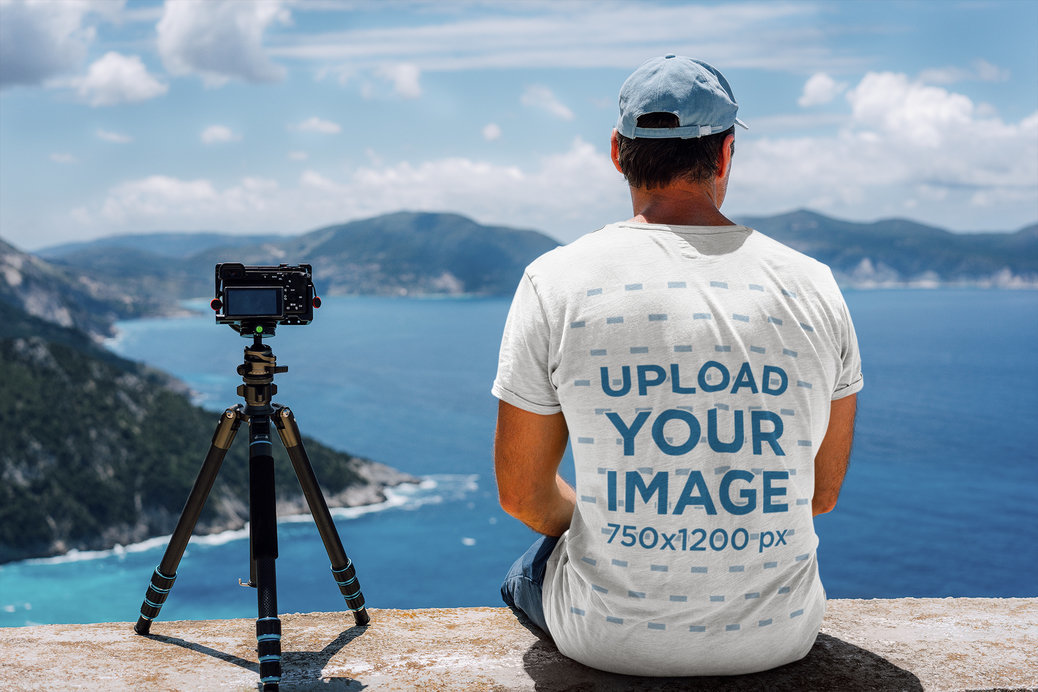 Placeit - Back-View T-Shirt Mockup of a Man Enjoying the Landscape