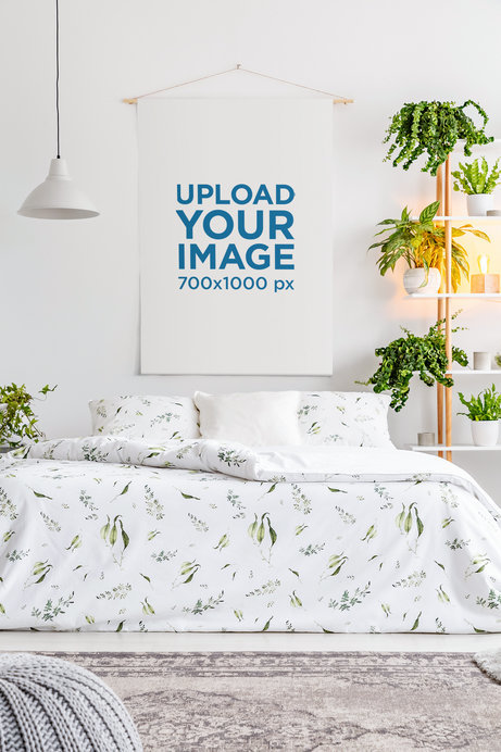 Placeit - Mockup of an Art Print Hanging Over a Comfy Bed
