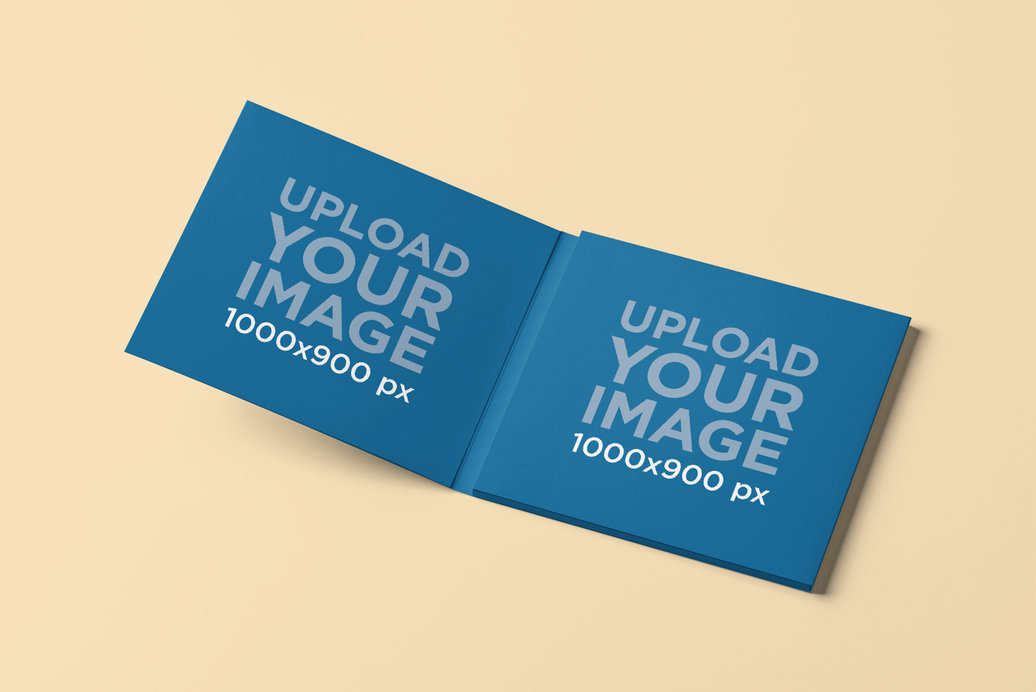 Placeit - Mockup of an Open Digipak Placed on a Flat Color Surface