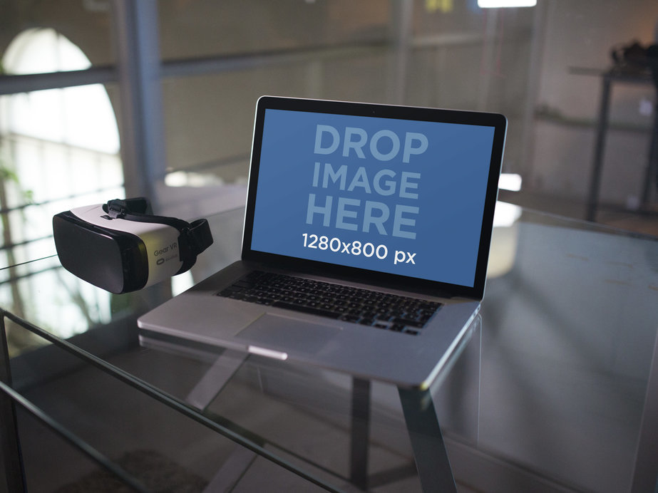 Placeit - Mockup of a MacBook Pro and an Oculus Gear VR Device Lying on ...