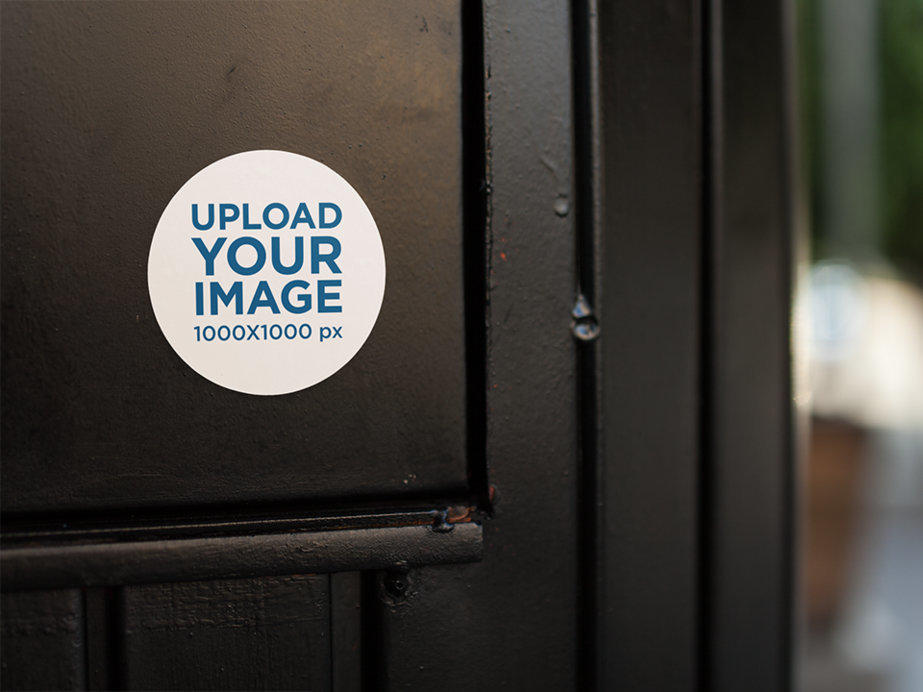 Placeit - Round Sticker on a Black Door Template