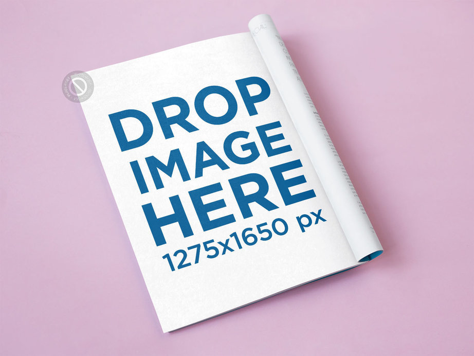 Placeit - Open Folded Magazine Lying Over a Pink Surface Mockup