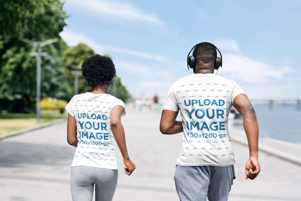 Placeit - T-Shirt Mockup of a Fit Couple Running Together