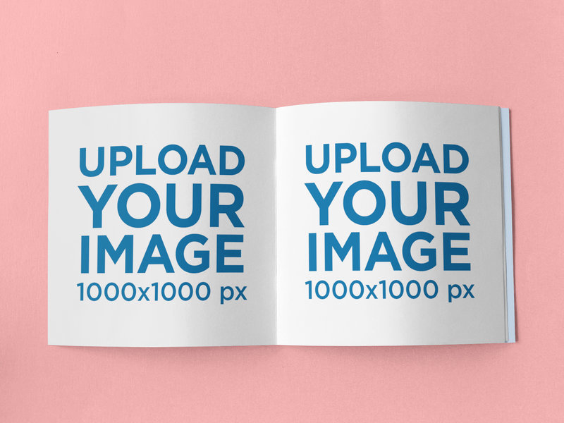 Placeit - Horizontal Booklet Opened Resting on a Yellow Surface Template