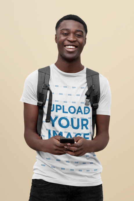 Placeit - Mockup of a College Student with a Basic T-Shirt Standing at ...