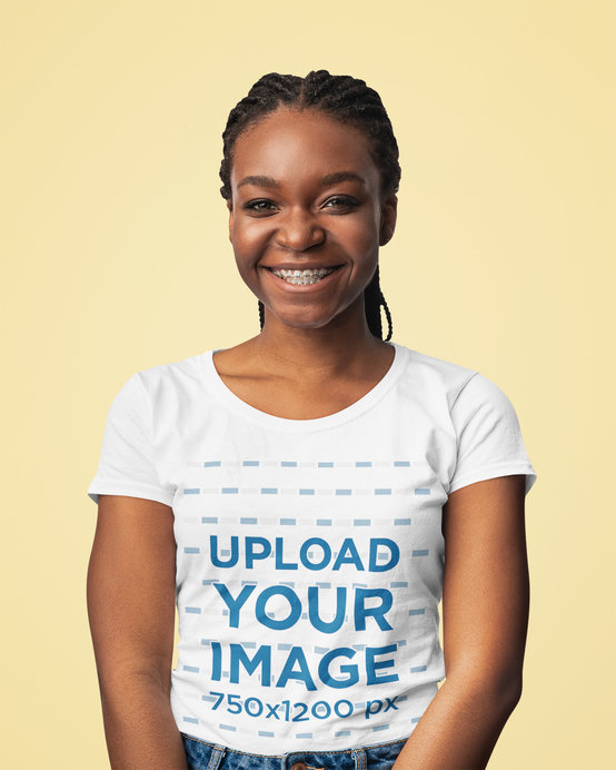 Placeit - Mockup of a Woman Wearing a Round Neck Tee at a Studio