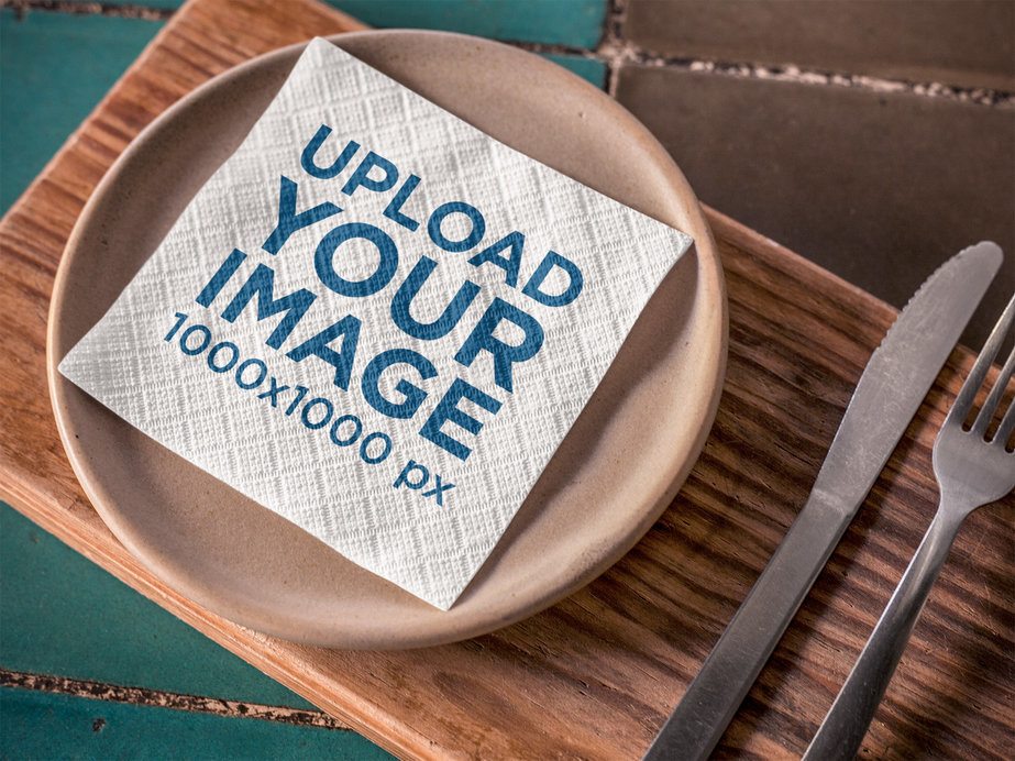 Placeit - Napkin Template on a Plate With Cutlery Besides