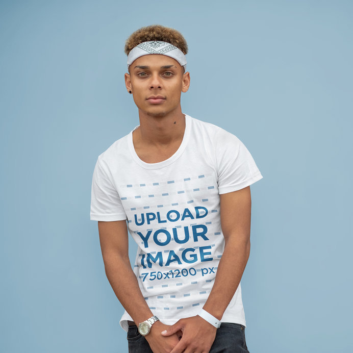Placeit - T-Shirt Mockup Featuring a Serious Young Man With Curly Hair