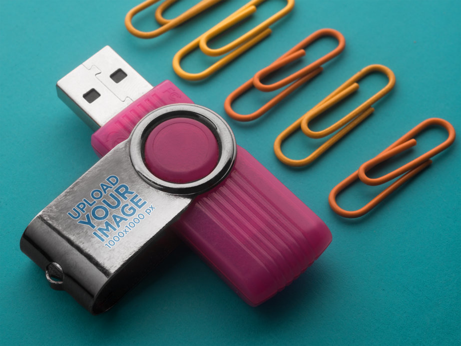 Placeit - Purple USB Flash Drive Template Lying on a Turquoise Surface ...