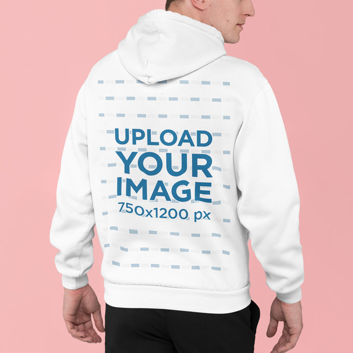 Placeit - Back View Mockup of a Serious Man Wearing a Hoodie and Posing ...
