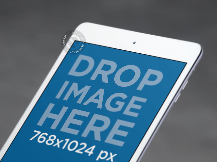 Placeit - White iPad Mini Mockup in Angled Close-Up View