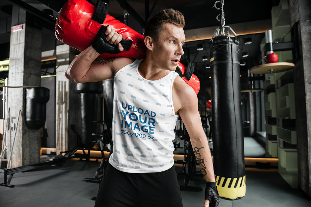Placeit - Tank Top Mockup of a Man Training in a Boxing Gym