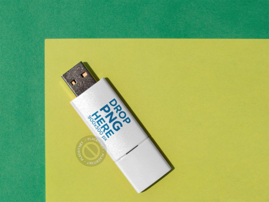Placeit - Mockup of a USB Flash Drive Lying Diagonally Over a Green and ...