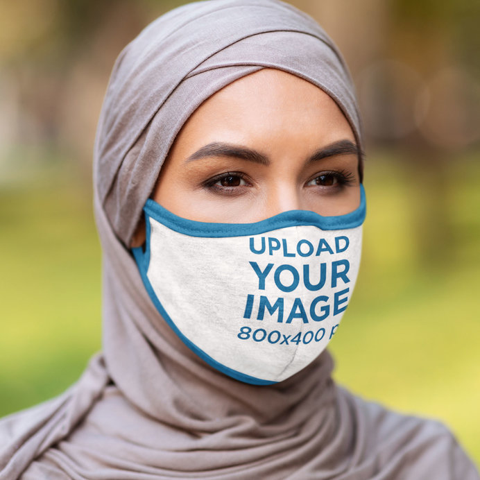 Placeit - Mockup Featuring a Woman in a Hijab Wearing a Face Mask