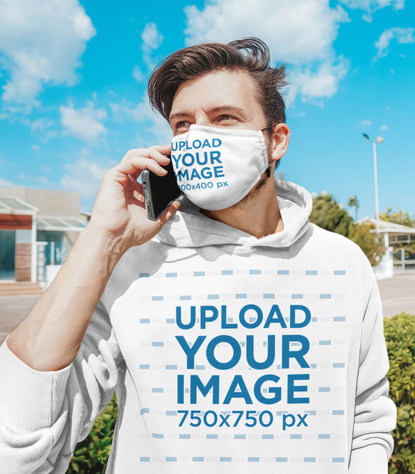 Placeit - Face Mask Mockup Featuring a Man Wearing a Pullover Hoodie