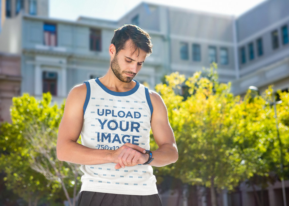 Placeit - Ringer Tank Top Mockup of a Man Checking His Running Time