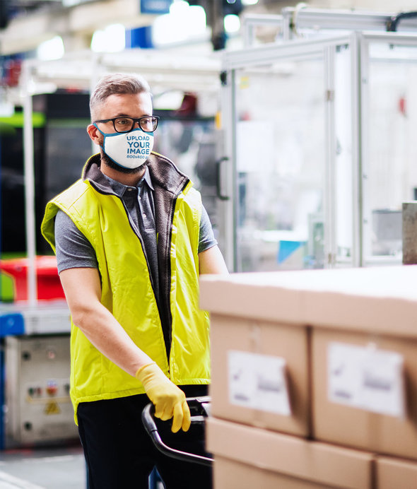 Placeit - Face Mask Mockup Featuring a Man Working at a Warehouse
